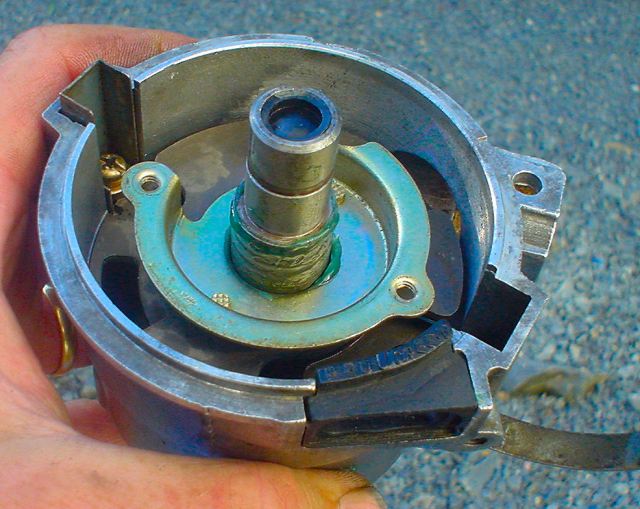 Install the other screw to hold breaker plate and install rubber ...